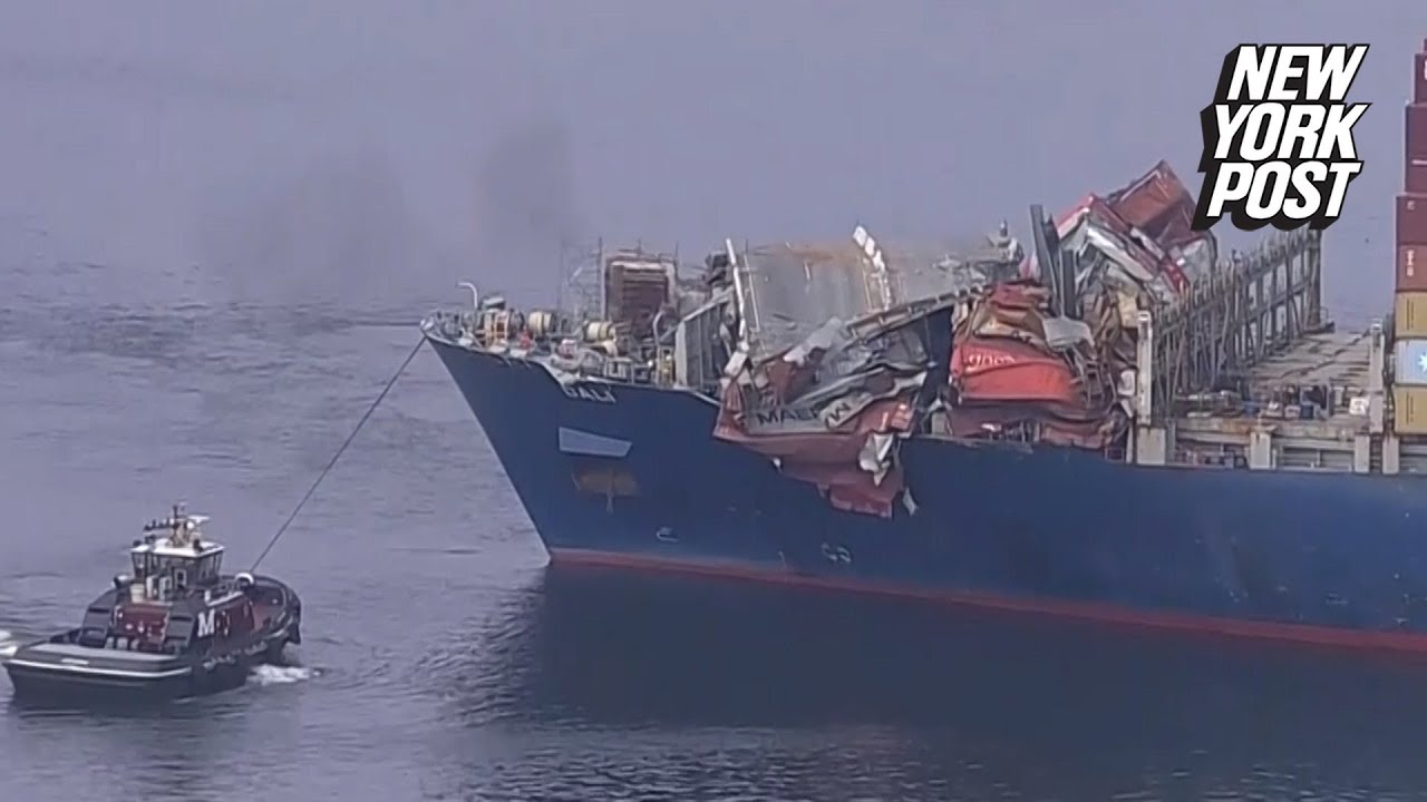 Ship behind Baltimore bridge collapse towed to port, but 21 crew ...